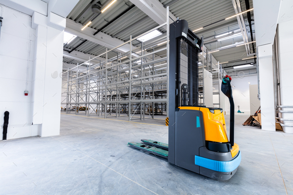Pallet jack in new warehouse Stock Photo by photocreo | PhotoDune