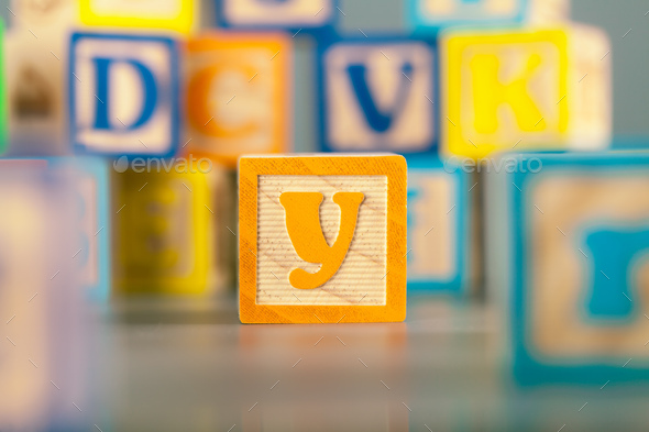 Photograph of colorful Wooden Block Letter Y Stock Photo by FabrikaPhoto