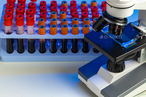 Close up photo of a microscope lenses examining glass sample Stock ...