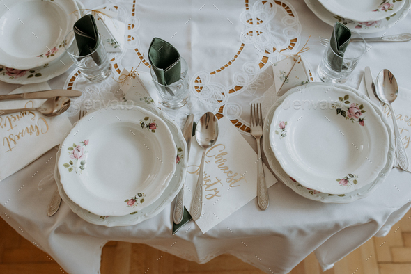 Table ready for dinner party at house Stock Photo by abugajny | PhotoDune