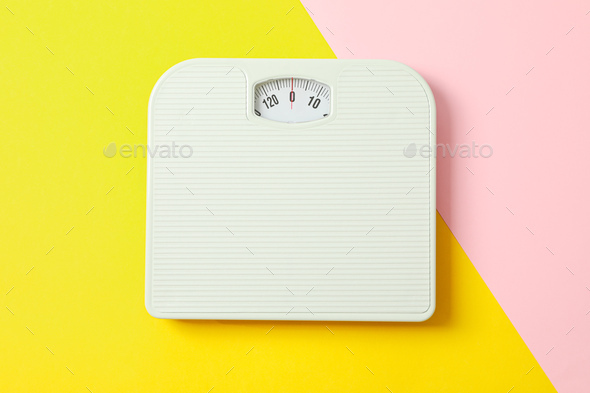 White weigh scales on two tone background, space for text Stock Photo ...