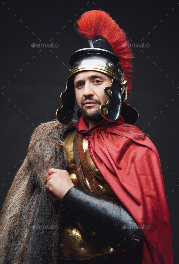 Ancient roman general wearing red cape and fur Stock Photo by fxquadro