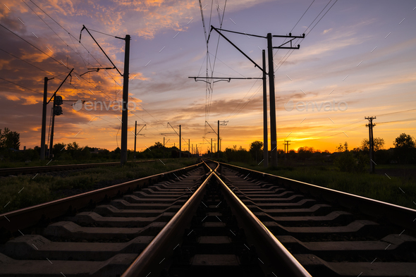 Railroad at sunset. Rail Freight and Passenger Transportation Stock ...