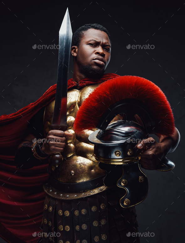 Angry roman warrior with gladius in breeze Stock Photo by fxquadro