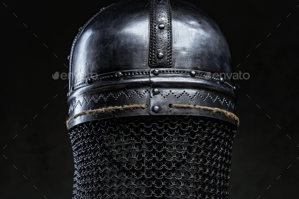 Back view studio shot of medieval iron helmet Stock Photo by fxquadro