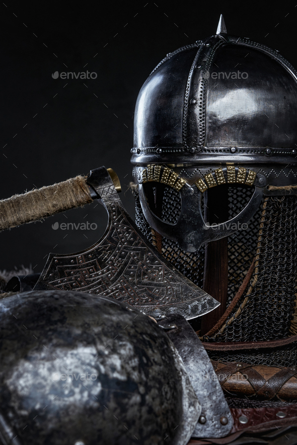 Knight medieval armor and axe against dark background Stock Photo by ...
