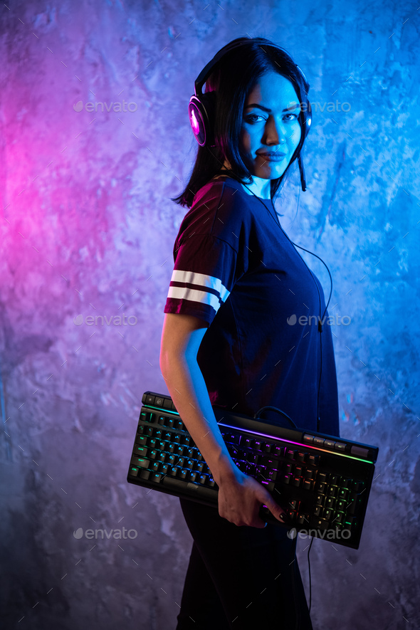 Beautiful Friendly Pro Gamer Streamer Girl Posing With a Keyboard in ...