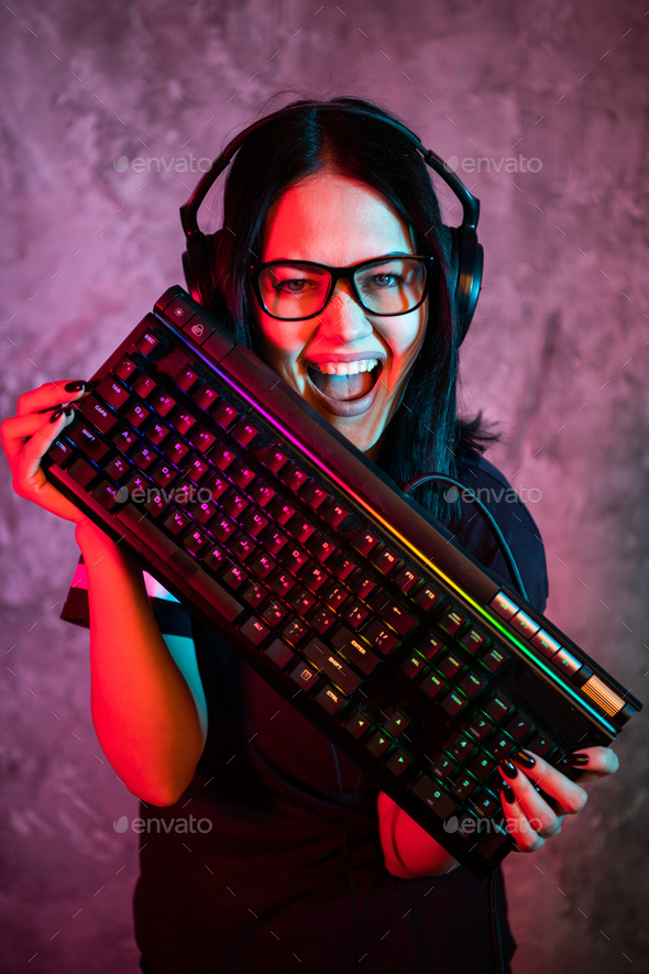 Beautiful Professional Gamer Girl With Keyboard. Casual Cute Geek ...
