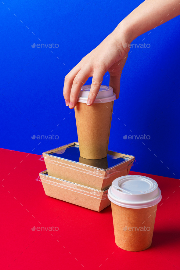 Delivery man hands giving food containers and packages Stock Photo by ...