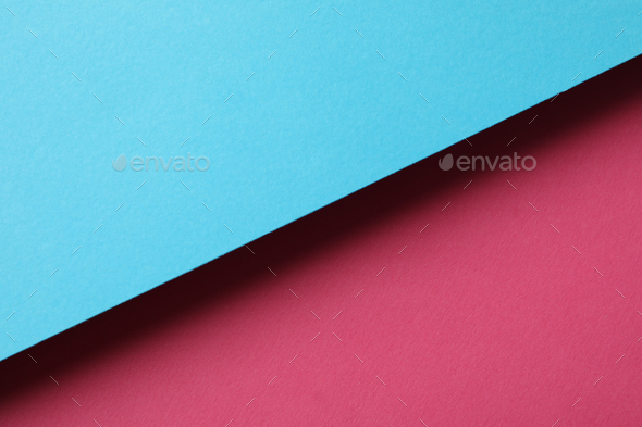 Two tone background made of sheets: blue and pink. Abstract background ...