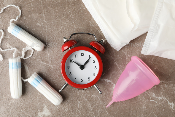 Menstruation period accessories on grey background, top view Stock ...