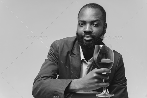 Close up portrait of a handsome young black man Stock Photo by prostooleh