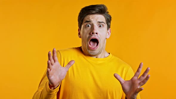 Young Scared Man Shouting Loud Isolated Over Yellow Background ...