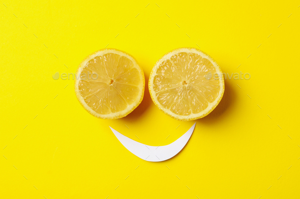 Smiley face made of lemons on yellow background Stock Photo by ...