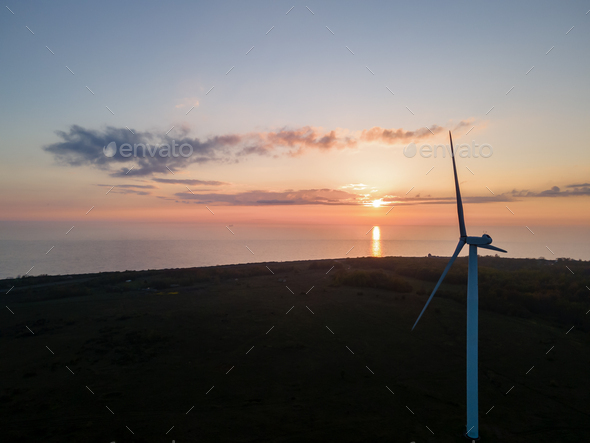 Wind turbine on sunset Stock Photo by molenira | PhotoDune