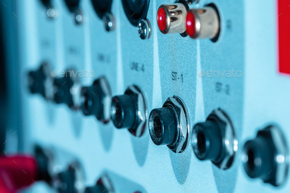 Rear panel of music system amplifier with wires Stock Photo by FabrikaPhoto