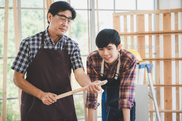 man person professional carpenter team work in construction with wood ...