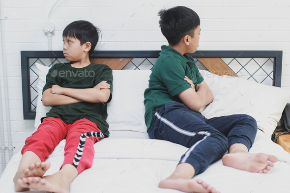 two boys fighting Stock Photo by Garakta-Studio | PhotoDune