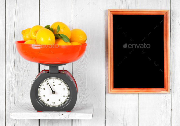 Lemons on scales Stock Photo by Artem_ka | PhotoDune