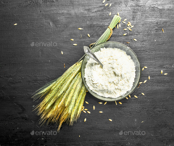 Flour with spikelets and wheat. Stock Photo by Artem_ka | PhotoDune