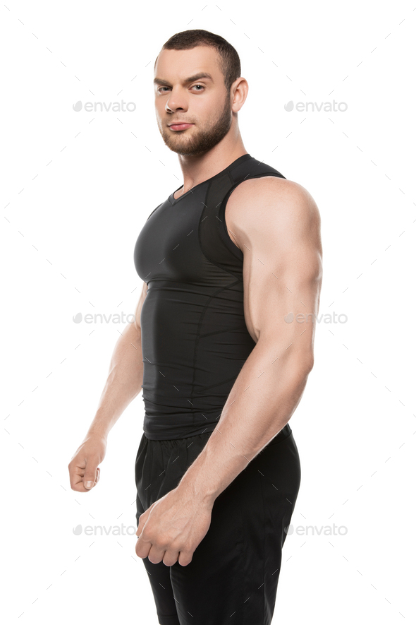 handsome young muscular man looking at camera isolated on white Stock ...