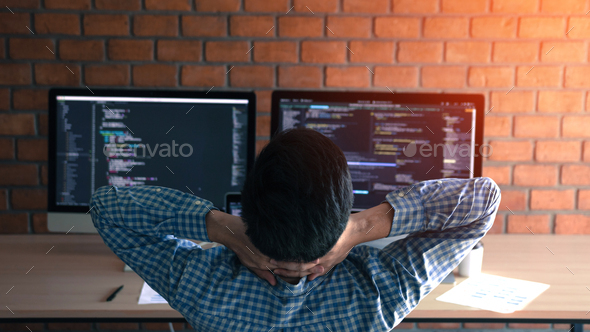 Software developers are relaxing from the hard work at his office ...