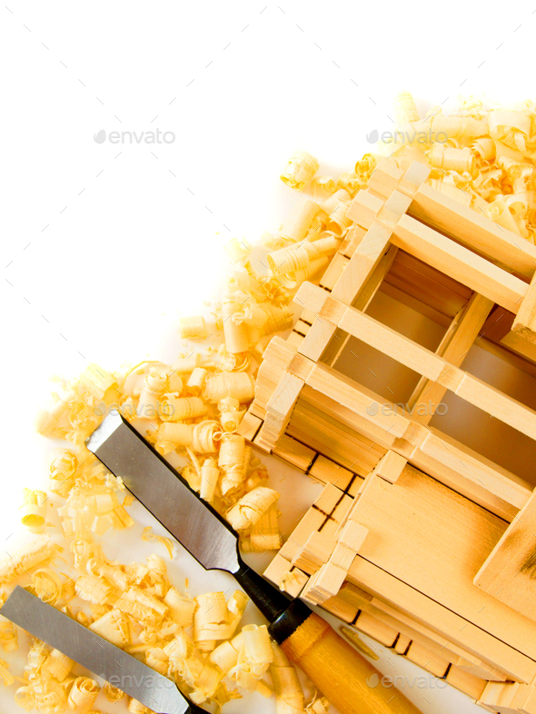 House construction. Joiner's works. The wooden house, chisel and ...