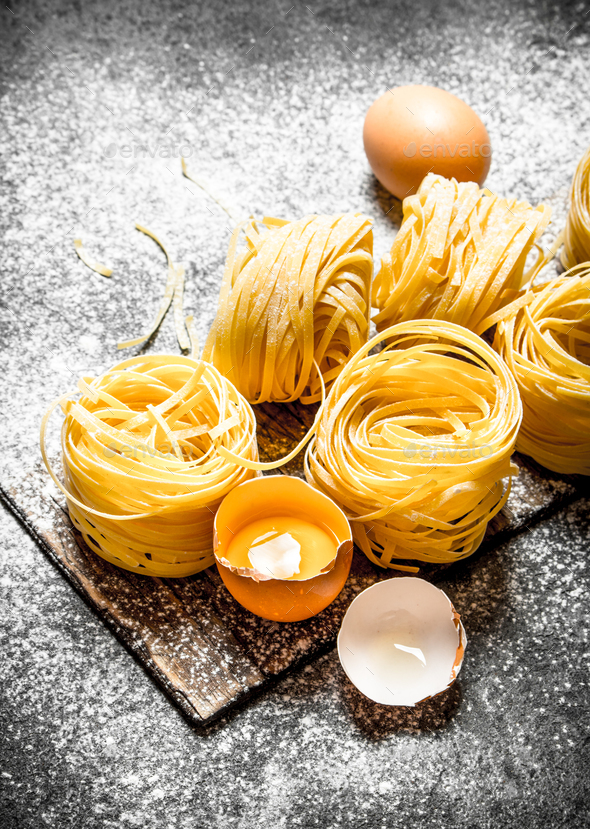 Pasta background. Cooking homemade pasta with egg and flour. Stock ...