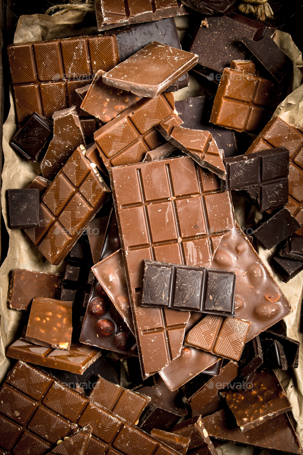 Broken chocolate bars. Stock Photo by Artem_ka | PhotoDune