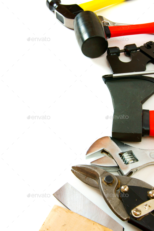 Many working tools - axe, hammer, scissors and others on white ...