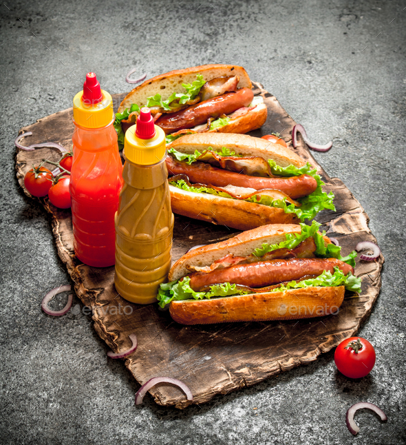 Fast food menu. Hot dogs beef barbecue with bacon and herbs. Stock ...