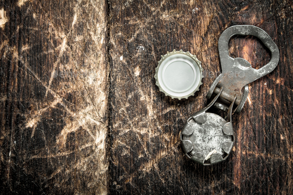 Opener and stopper for beer bottles. Stock Photo by Artem_ka | PhotoDune
