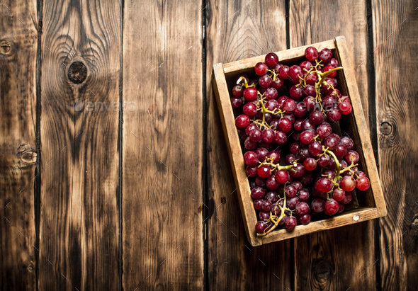 Red grapes in an old box. Stock Photo by Artem_ka | PhotoDune