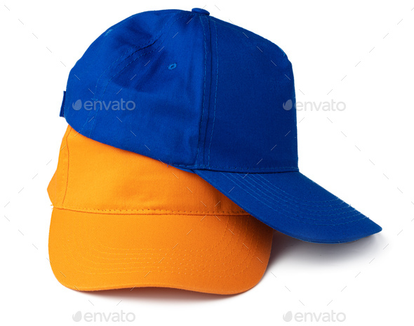 Stack of baseball caps isolated on white background Stock Photo by ...