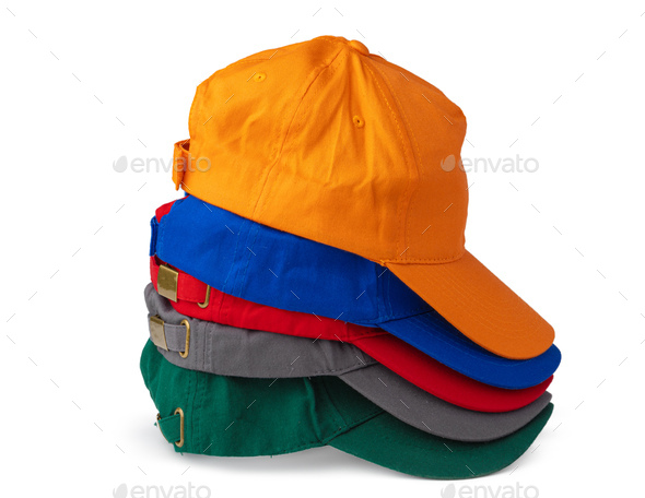 Stack of baseball caps isolated on white background Stock Photo by ...