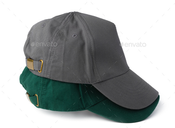 Stack of baseball caps isolated on white background Stock Photo by ...