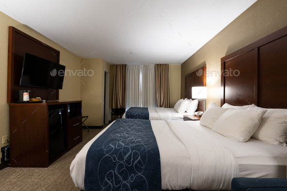 Interior of generic hotel room - two queen bed room Stock Photo by ...