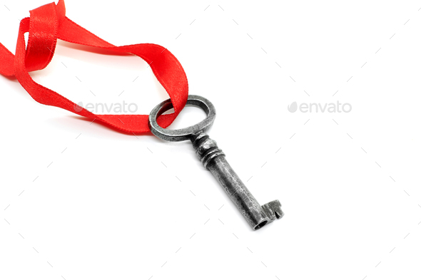 Vintage silver key with red ribbon on white background Stock Photo by ...