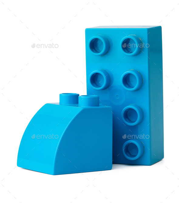 Blue plastic building block isolated on white Stock Photo by FabrikaPhoto