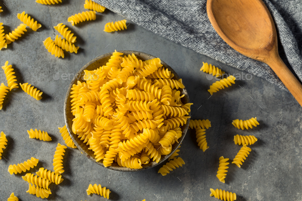 Dry Yellow Organic Rotini Pasta Stock Photo by bhofack2 | PhotoDune