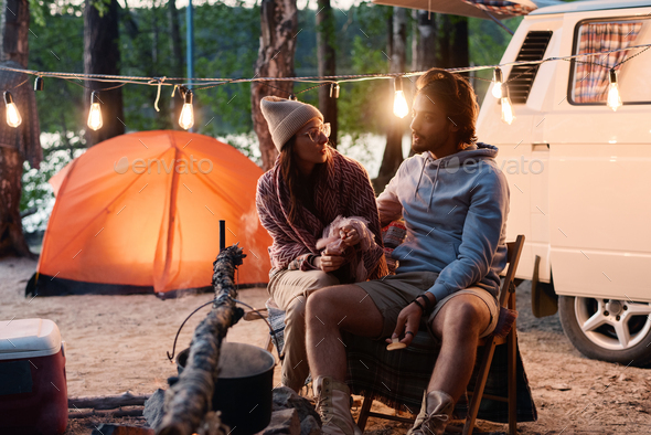 Couple arranging camping outdoors Stock Photo by AnnaStills | PhotoDune