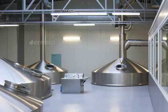 Interior of brewery, large steel storage tanks for brewing beer. Stock ...