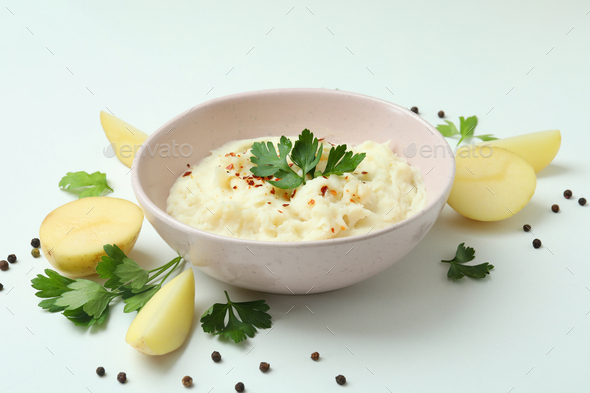 Plate of mashed potatoes and ingredients on white background Stock ...