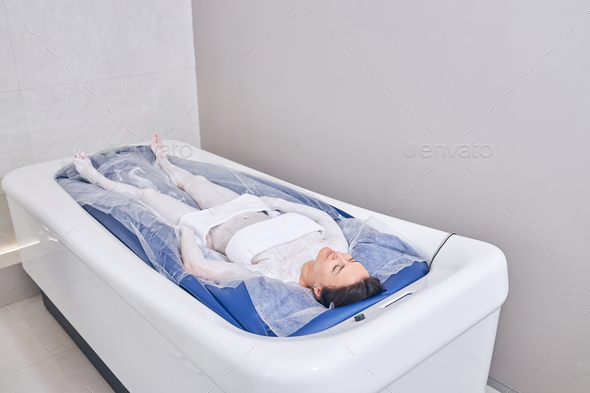 Modern floating machine and young woman relaxing on it Stock Photo by ...
