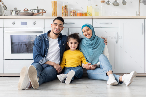 Portrait Of Happy Middle Eastern Family With Little Daughter Posing In ...