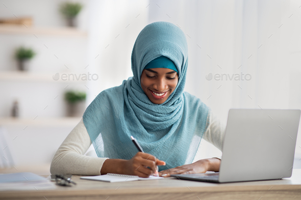 Distance Learning Concept. Smiling Black Islamic Woman In Hijab Study ...