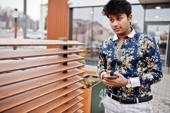 Indian man at fast food cafe Stock Photo by ASphotostudio | PhotoDune