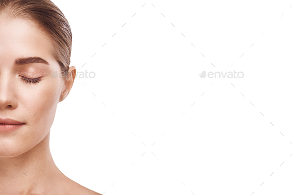 Half of beautiful woman face close-up studio on white. Cropped photo ...