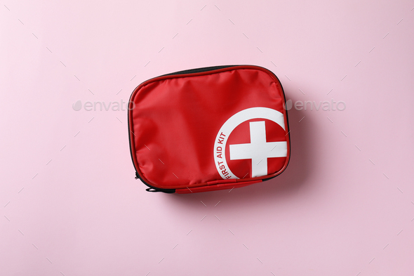 First aid medical kit on pink background Stock Photo by AtlasComposer