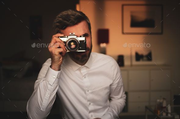 Self-portrait at sunset light through window Stock Photo by Pasanheco